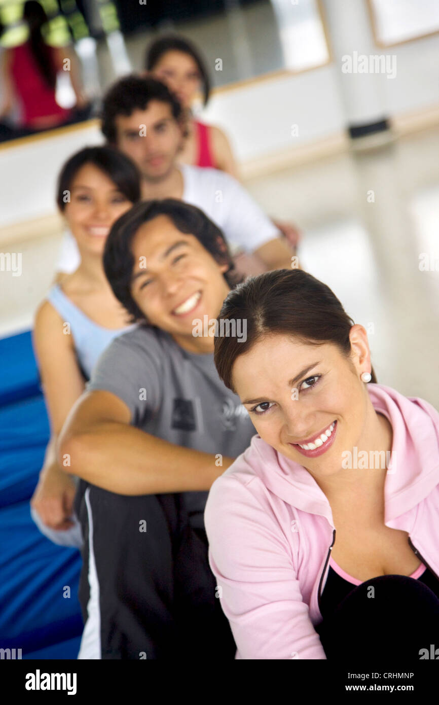group of people in the gym sitting and smiling Stock Photo - Alamy