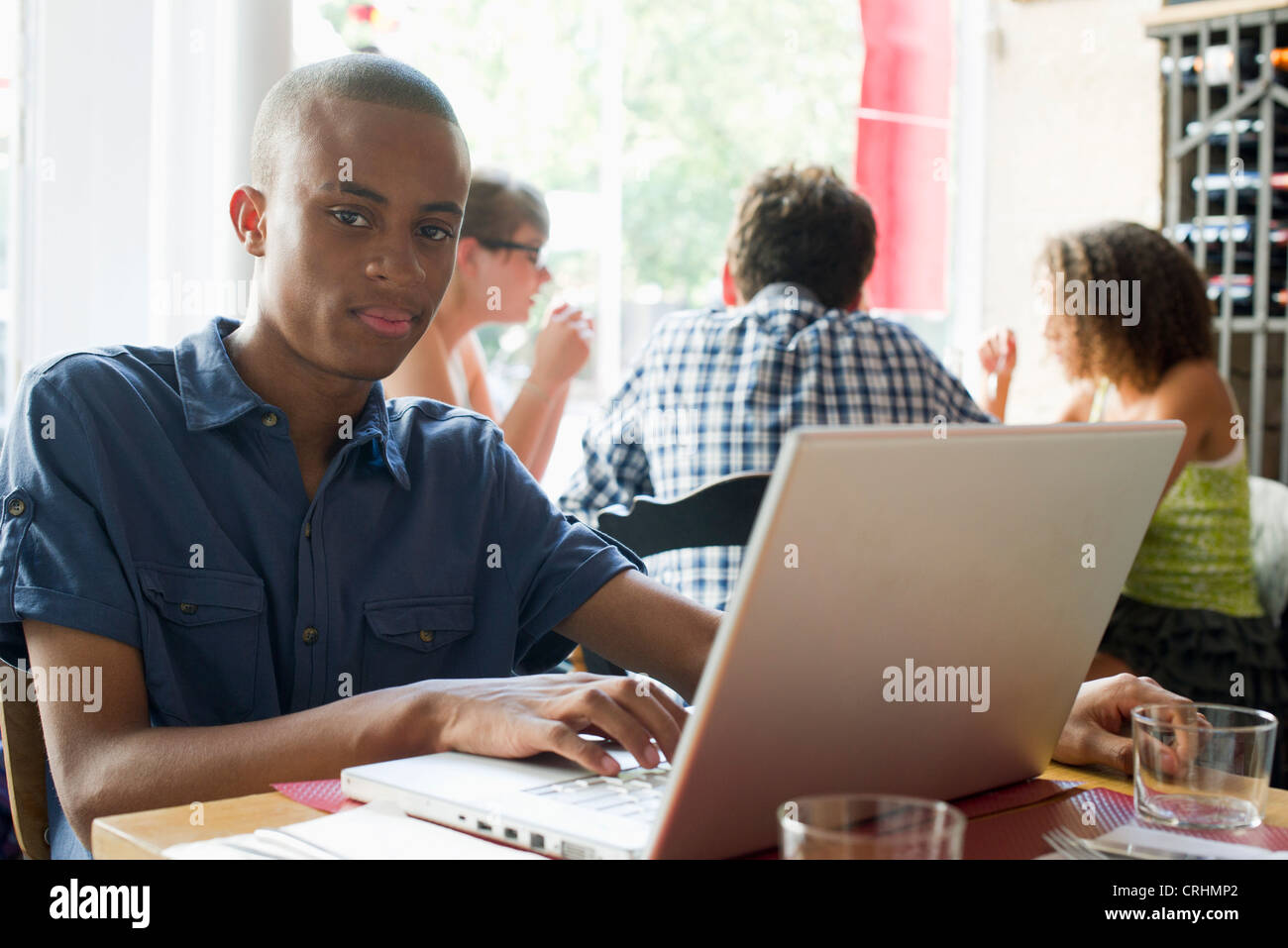 Students cafe laptops hi-res stock photography and images - Alamy