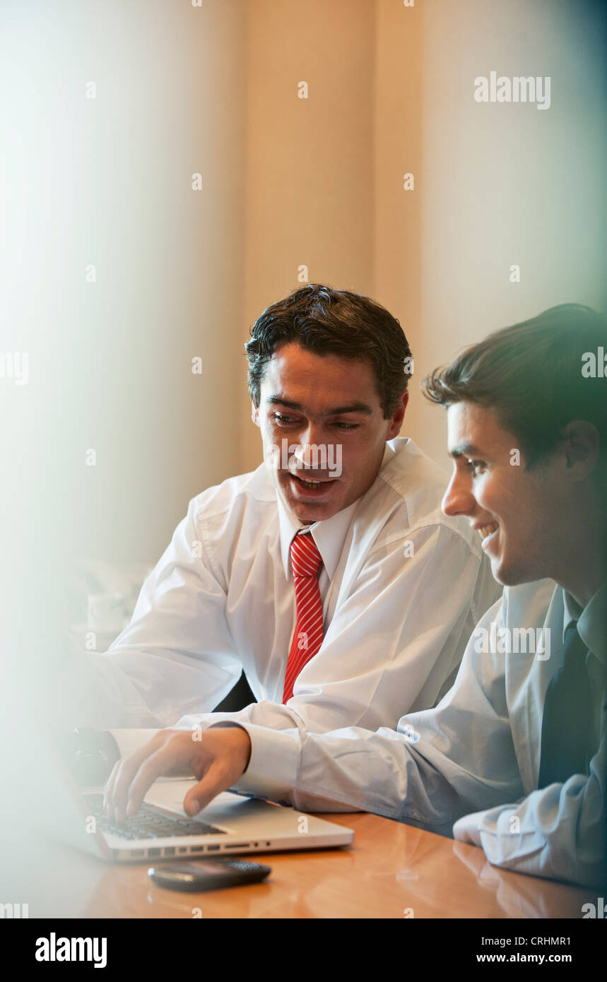 Businessmen in discussion Stock Photo - Alamy