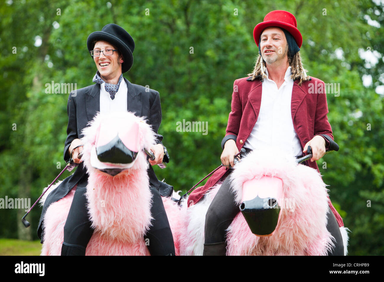 Entertainers wearing pink flamingo costumes at the Ambleside olympic ...