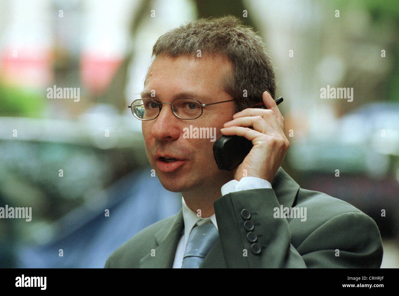 A man with his mobile phone Stock Photo - Alamy