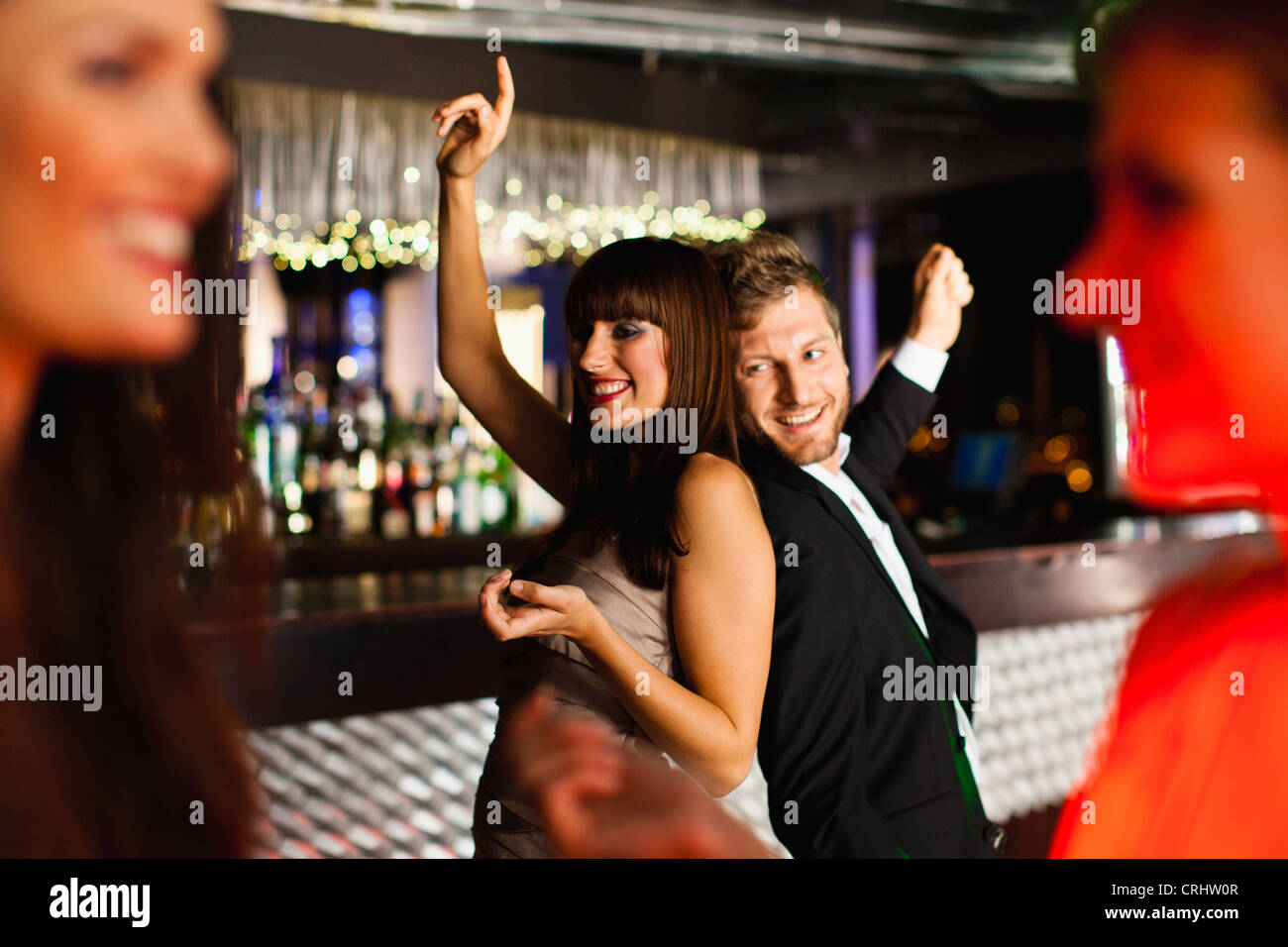 Couple dancing on nightclub dance floor hi-res stock photography and ...