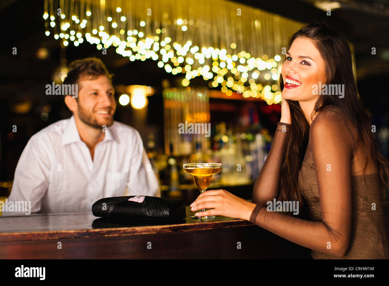 Woman flirting with men bar hi-res stock photography and images - Alamy
