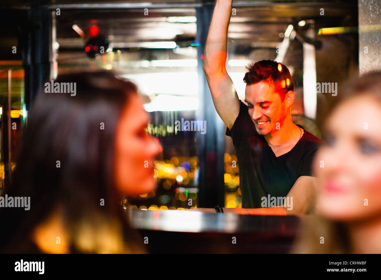 Bartender waving hi-res stock photography and images - Alamy