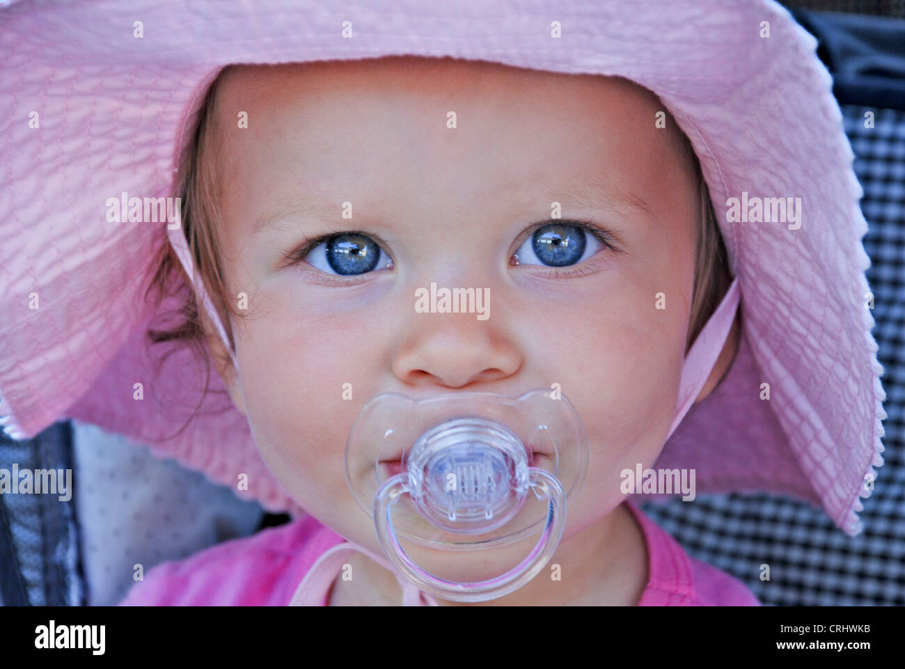 baby girl with comforter Stock Photo - Alamy