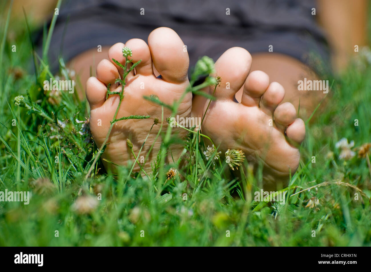 barefooted in meadow Stock Photo - Alamy