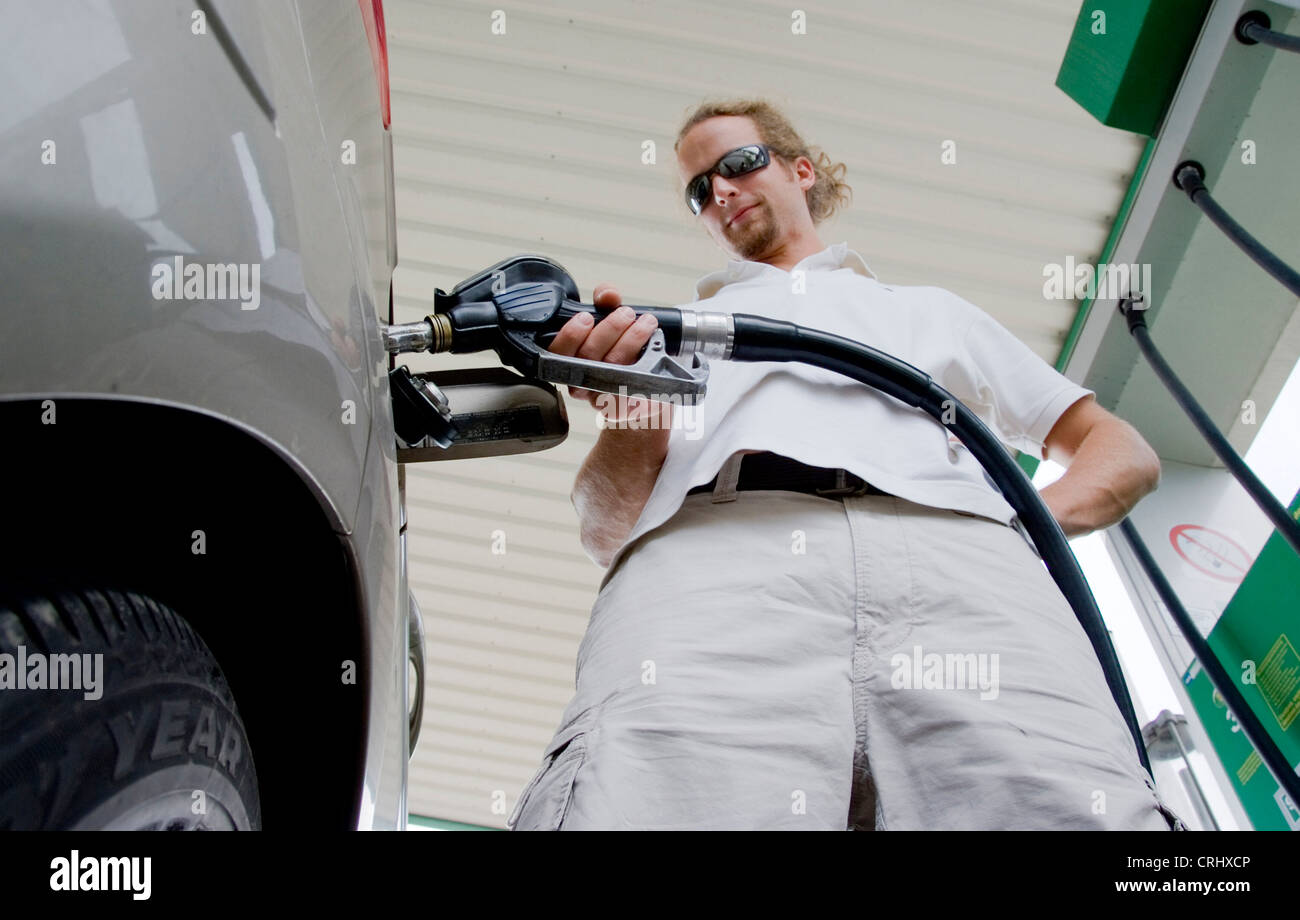man at petrol station Stock Photo - Alamy
