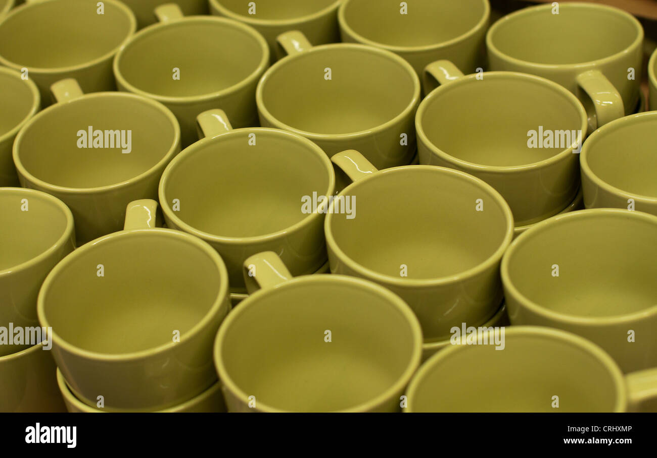 many empty green coffee cups Stock Photo - Alamy