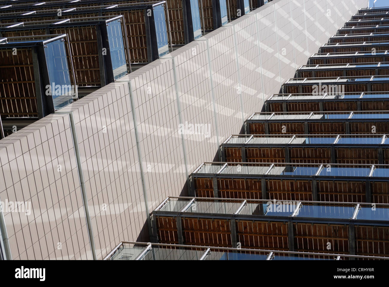 Abstract image looking up a high rise apartment building in the centre ...