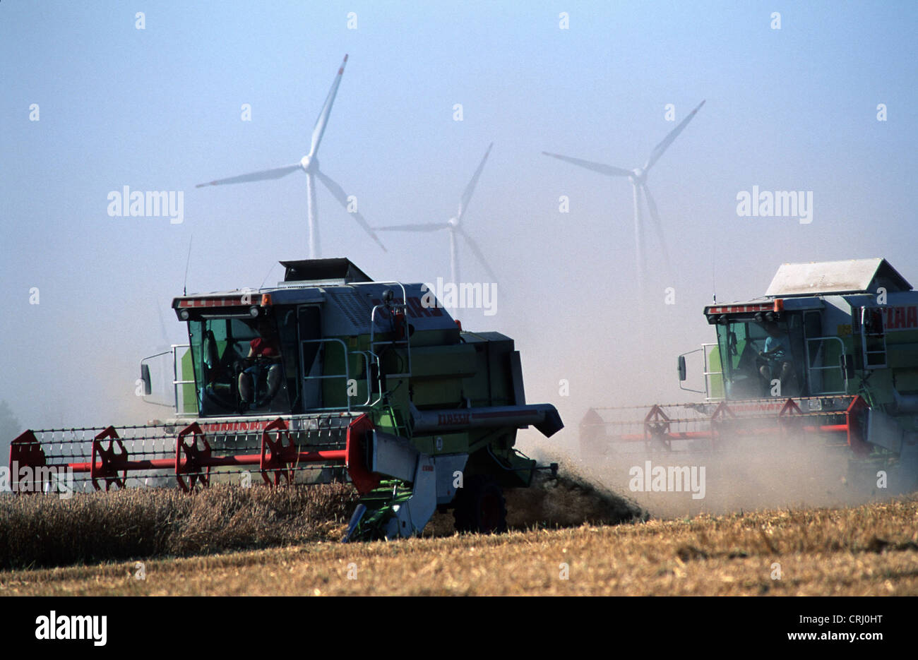 Harvesting combine harvester wind hi-res stock photography and images ...