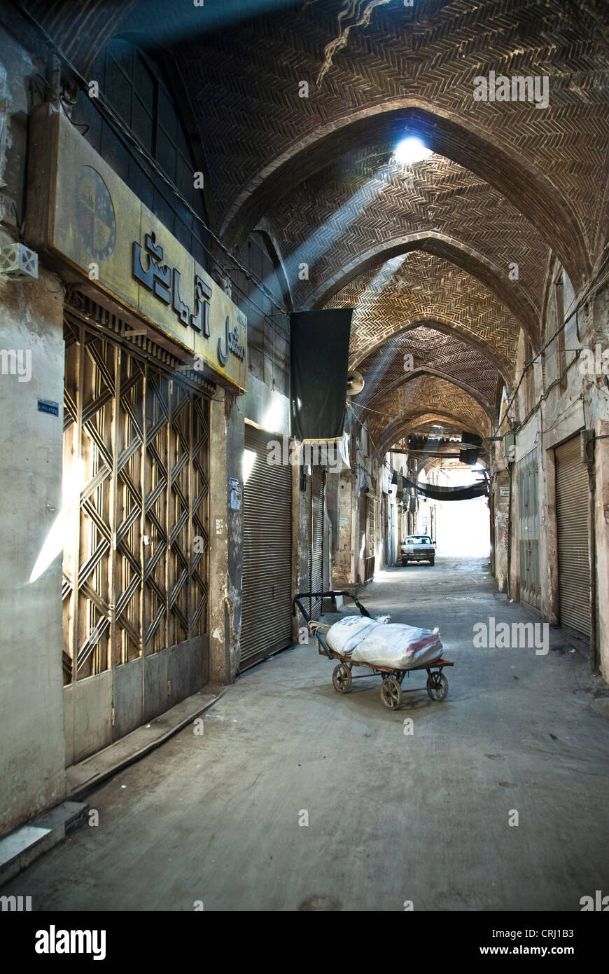 View of an empty alley in the Bazaar of Esfahan during Prayer, Iran ...