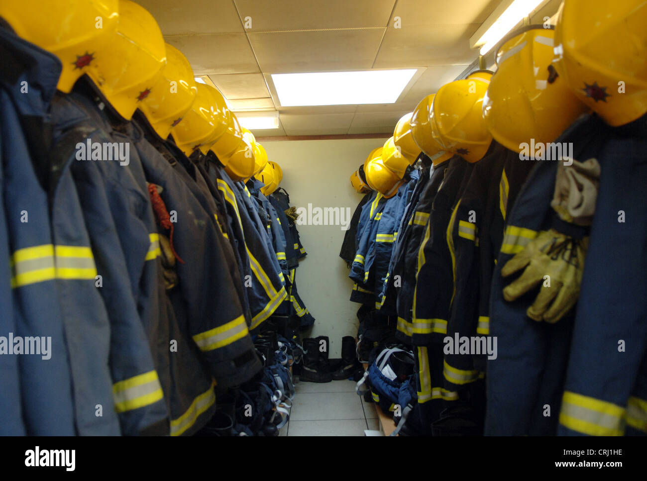 fire fighters changing rooms full of equipment Stock Photo - Alamy