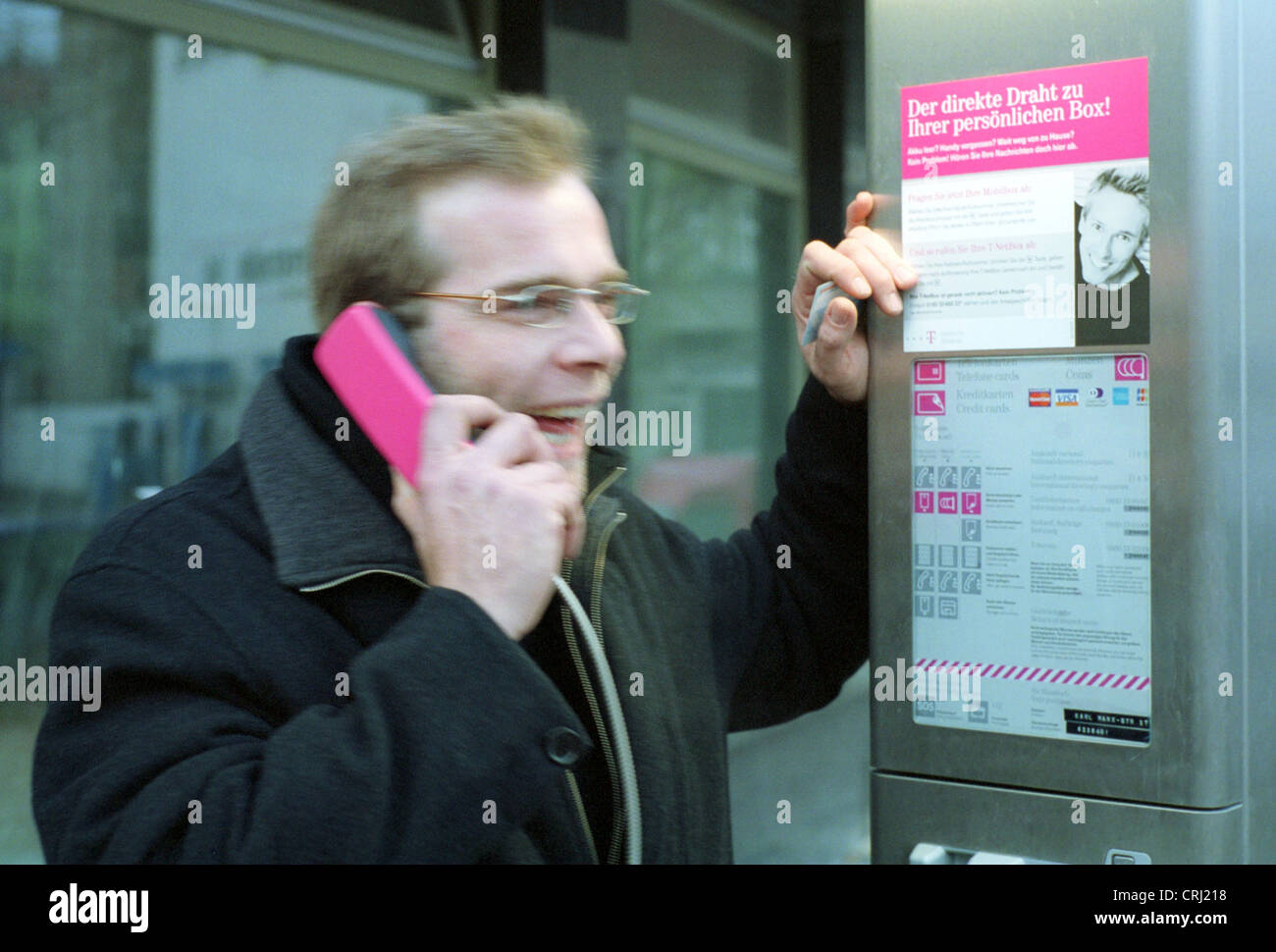 Berlin, public phone booth in Deutsche Telekom AG Stock Photo - Alamy