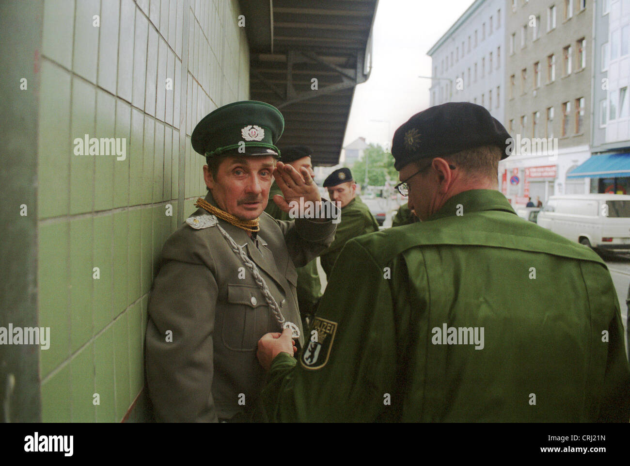 Police arrest two freaky guys in Berlin-Kreuzberg Stock Photo - Alamy