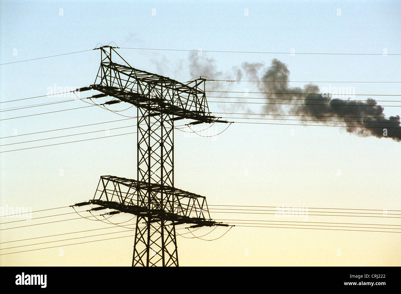 Pylon and smoke Stock Photo - Alamy
