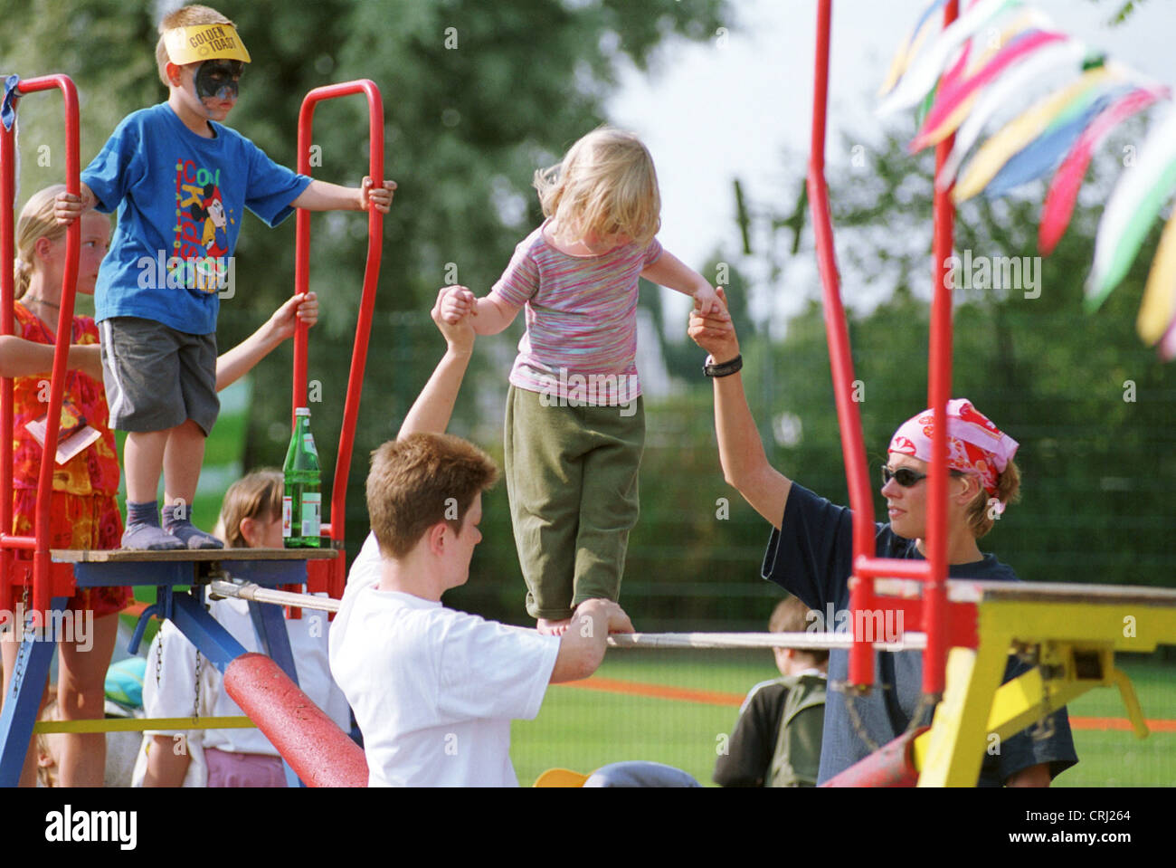 Girls when balancing on a tightrope Stock Photo - Alamy