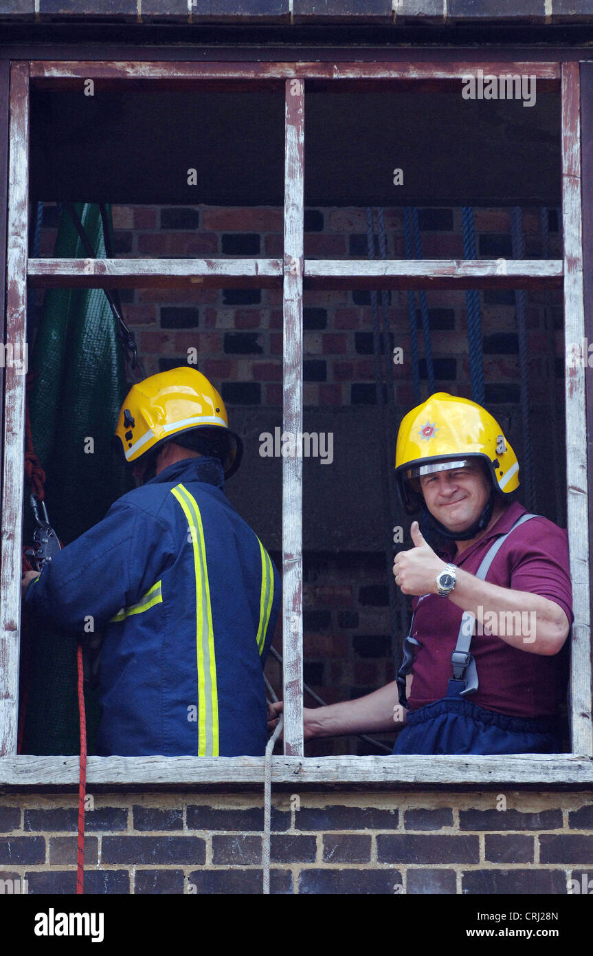 Two fire fighters hi-res stock photography and images - Alamy