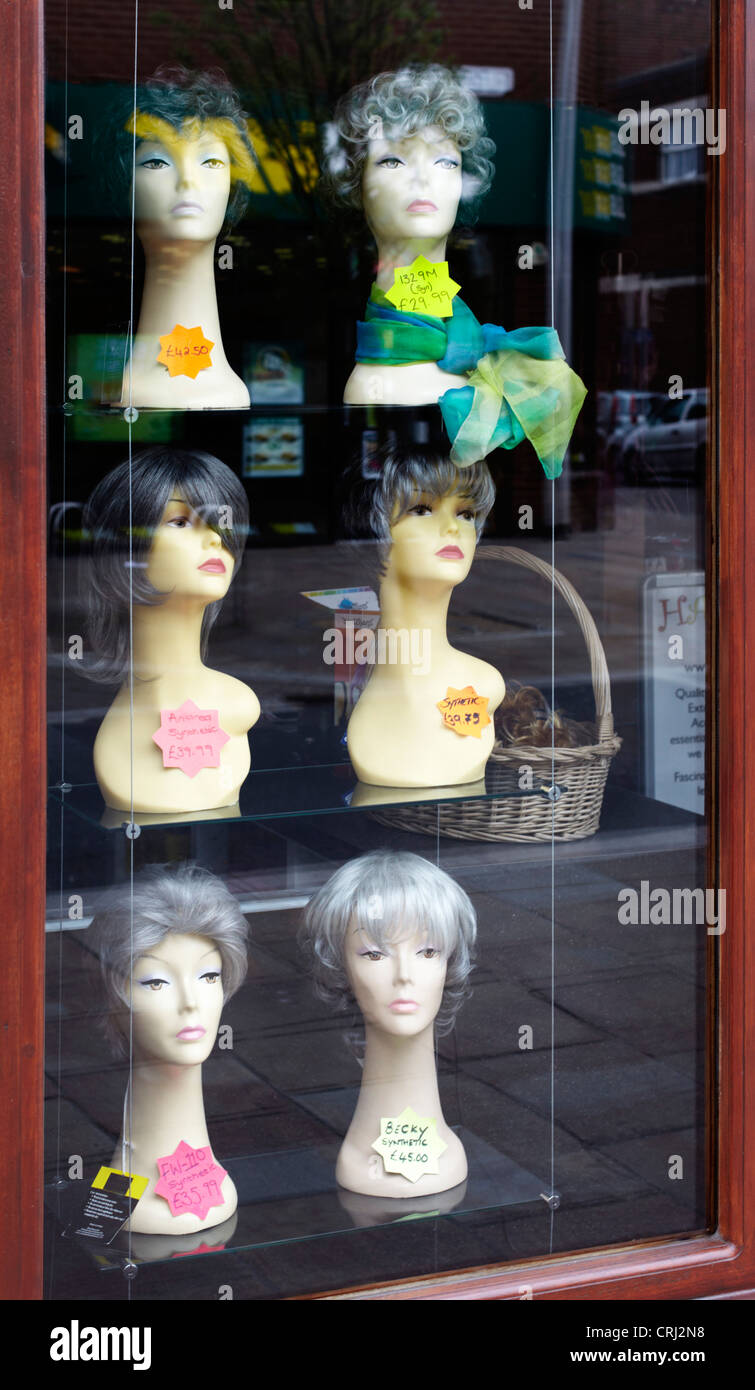 Wig shop window display hair hi-res stock photography and images - Alamy
