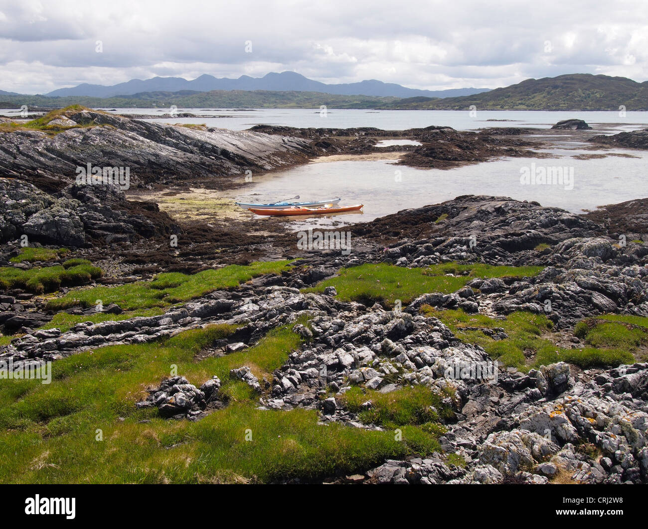 Sea kayaking amongst the skerries, Arisaig, Scotland Stock Photo - Alamy