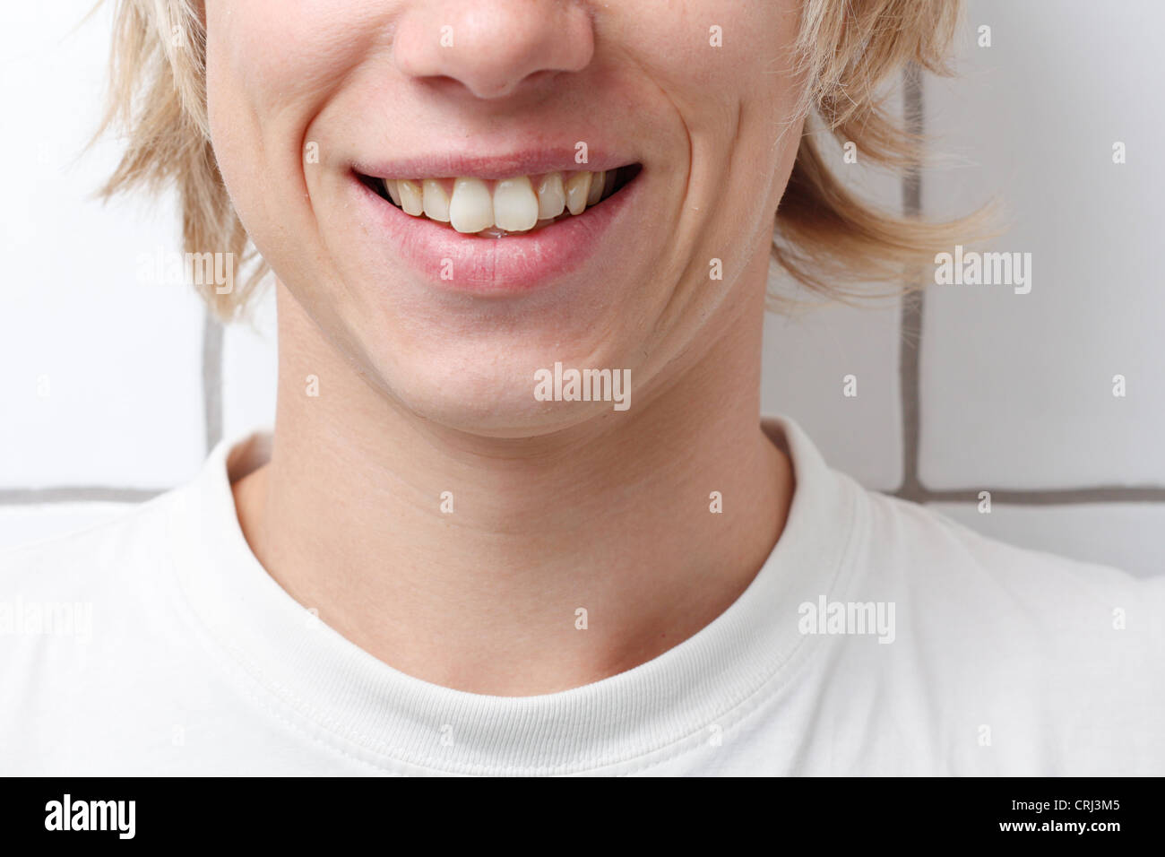 A man smiling showing his smile Stock Photo - Alamy