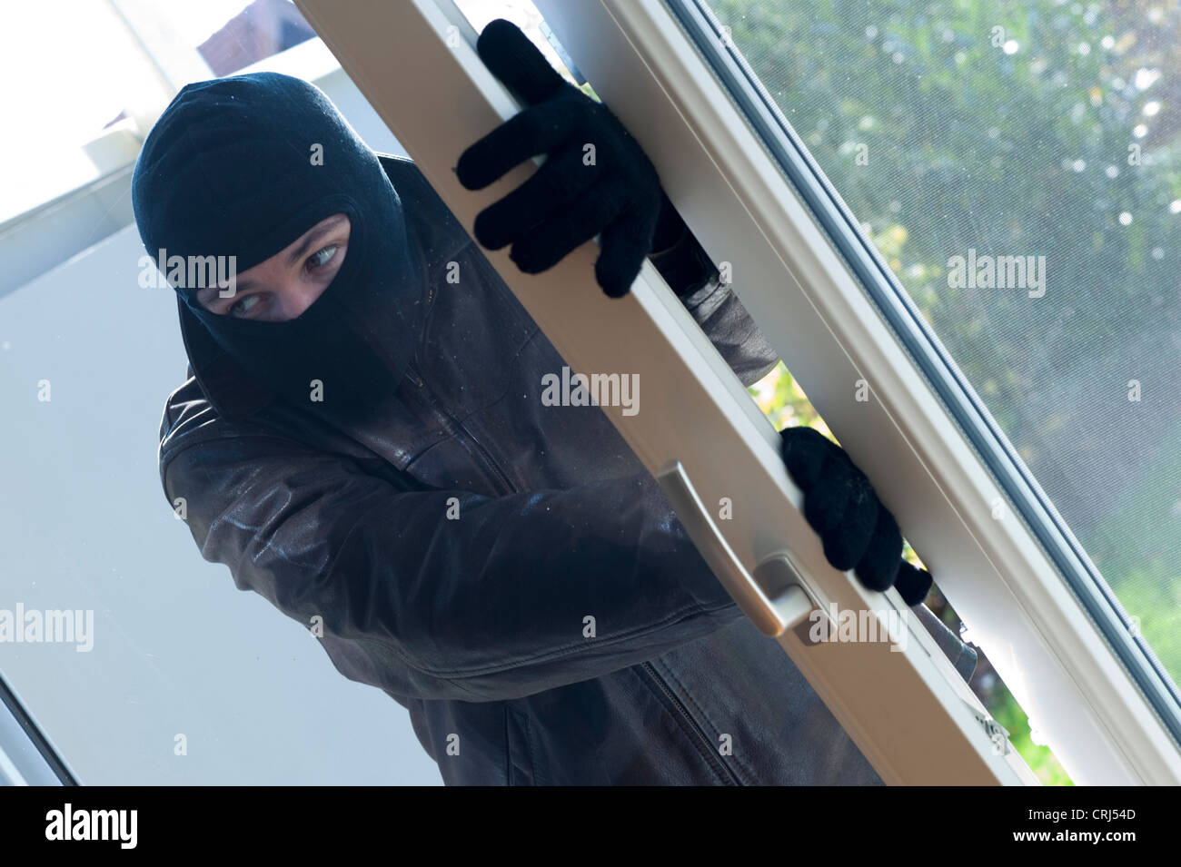 housebreaker breaking a backdoor Stock Photo - Alamy