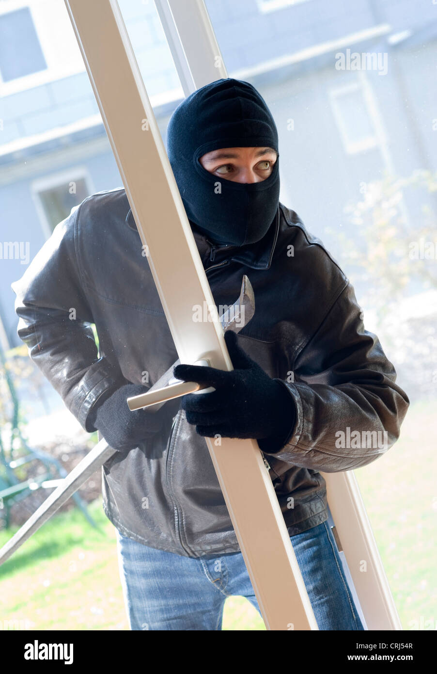 housebreaker breaking a backdoor Stock Photo - Alamy