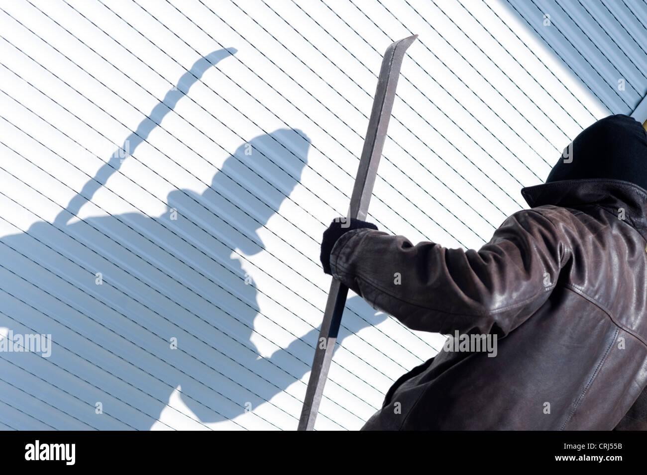 housebreaker breaking in through the backdoor, standing in front of ...