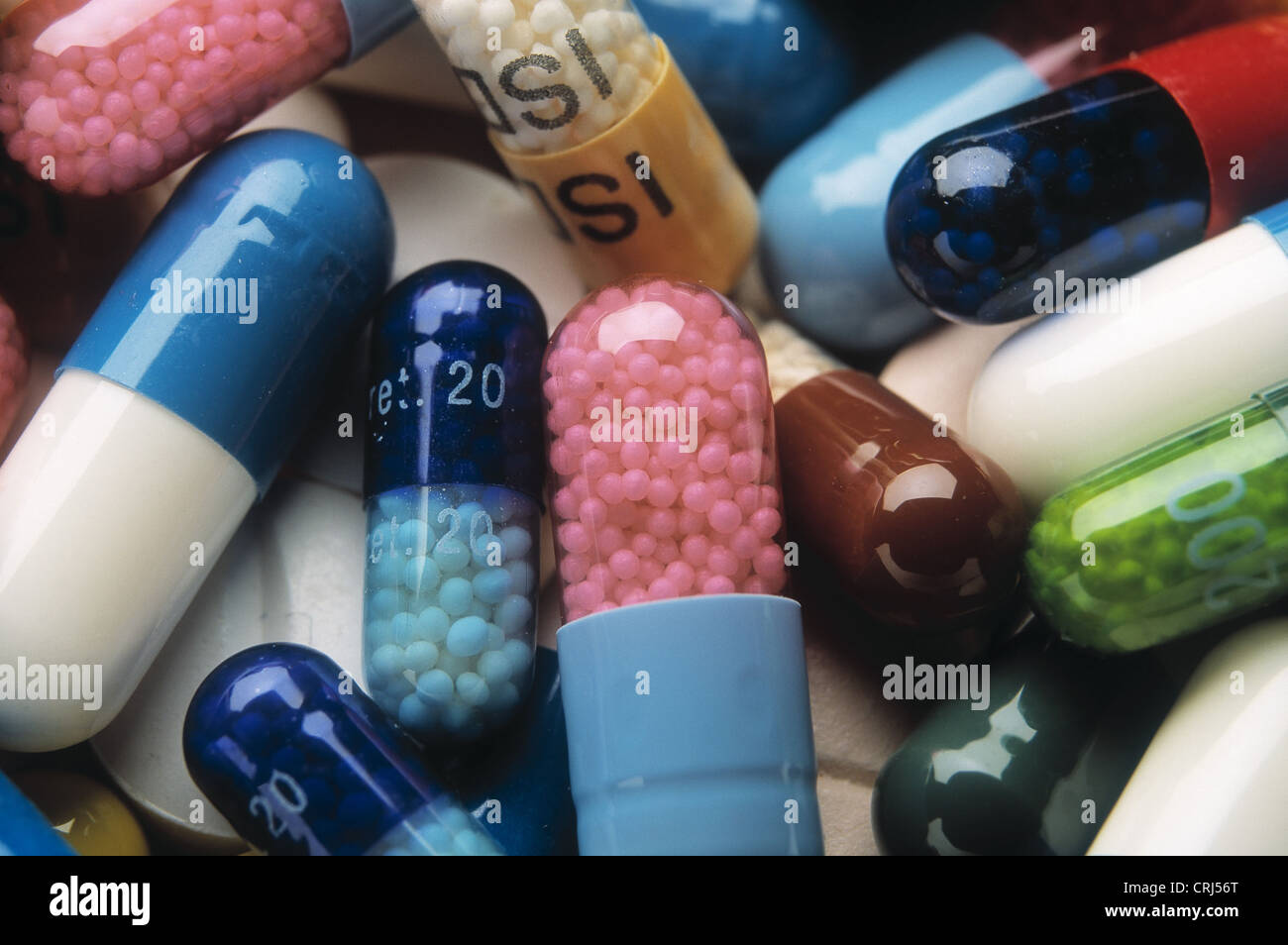 Drug capsules in different shapes and colors as Macro Stock Photo - Alamy