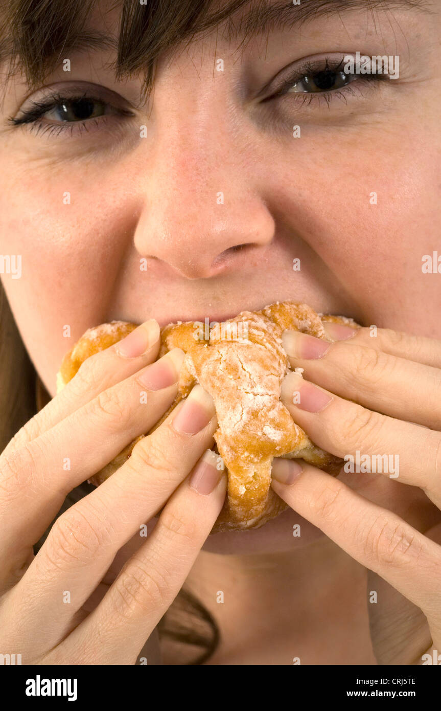 A young female jam donut junkie. Jam donuts have been criticized by ...