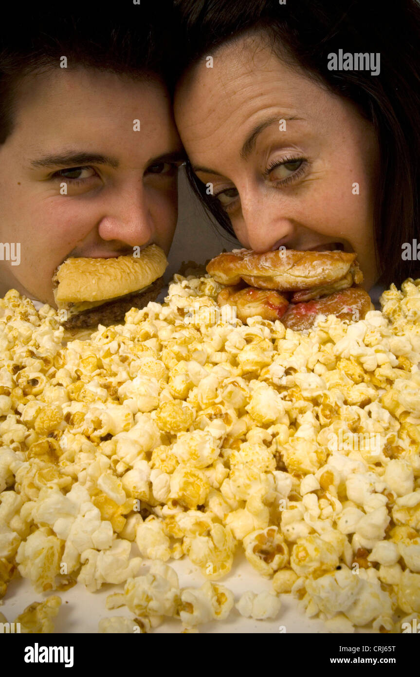 Man eating messy hamburger hi-res stock photography and images - Alamy