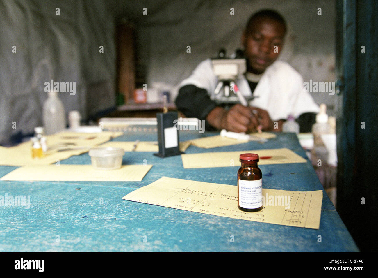 Screening at the microscope in Goma Stock Photo - Alamy