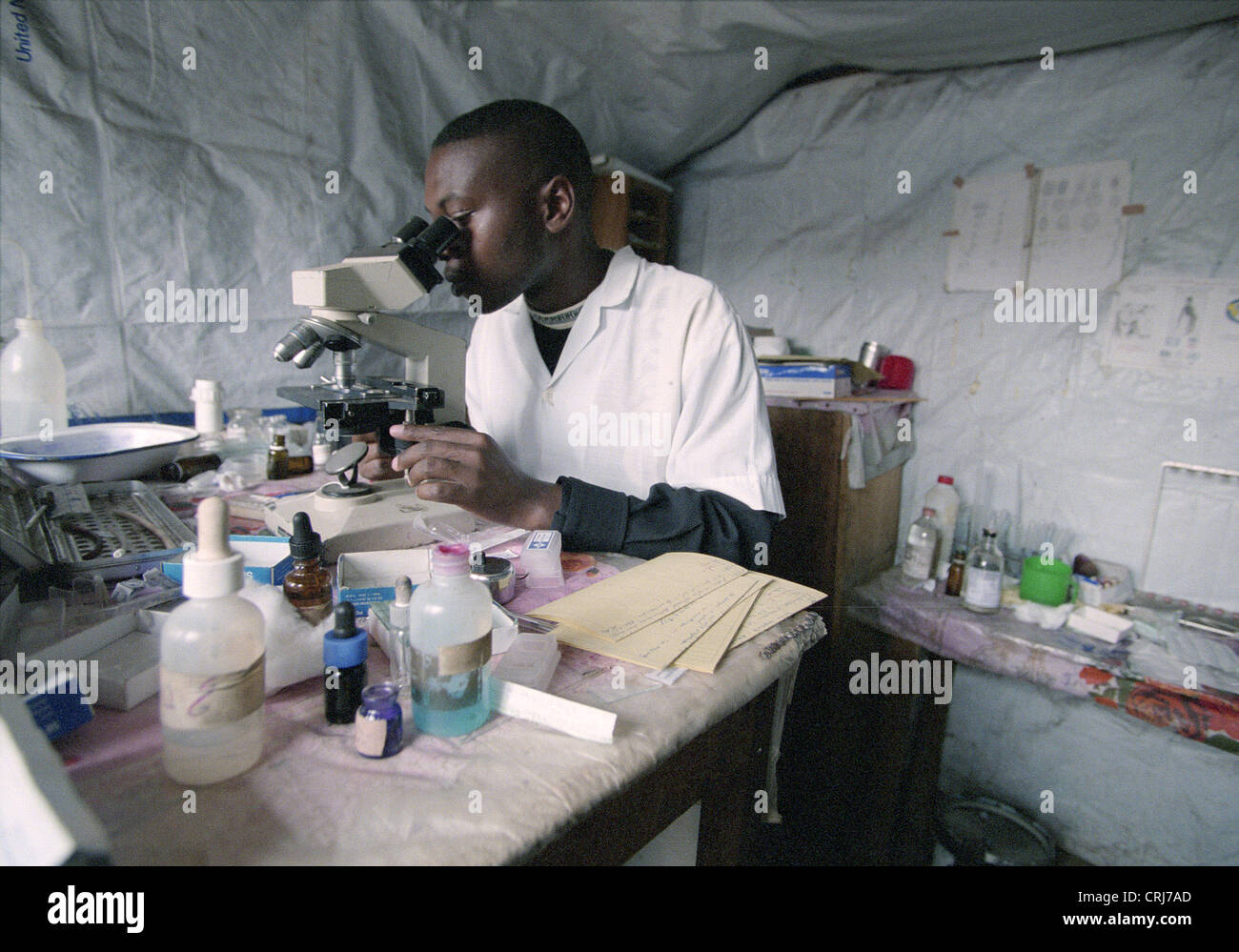 Screening at the microscope in Goma Stock Photo - Alamy