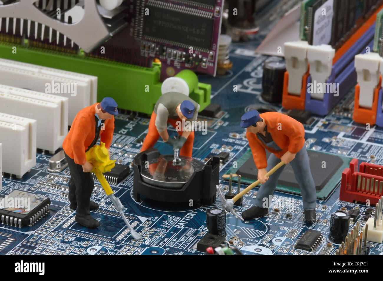 construction worker repairing bug in a PC Stock Photo - Alamy