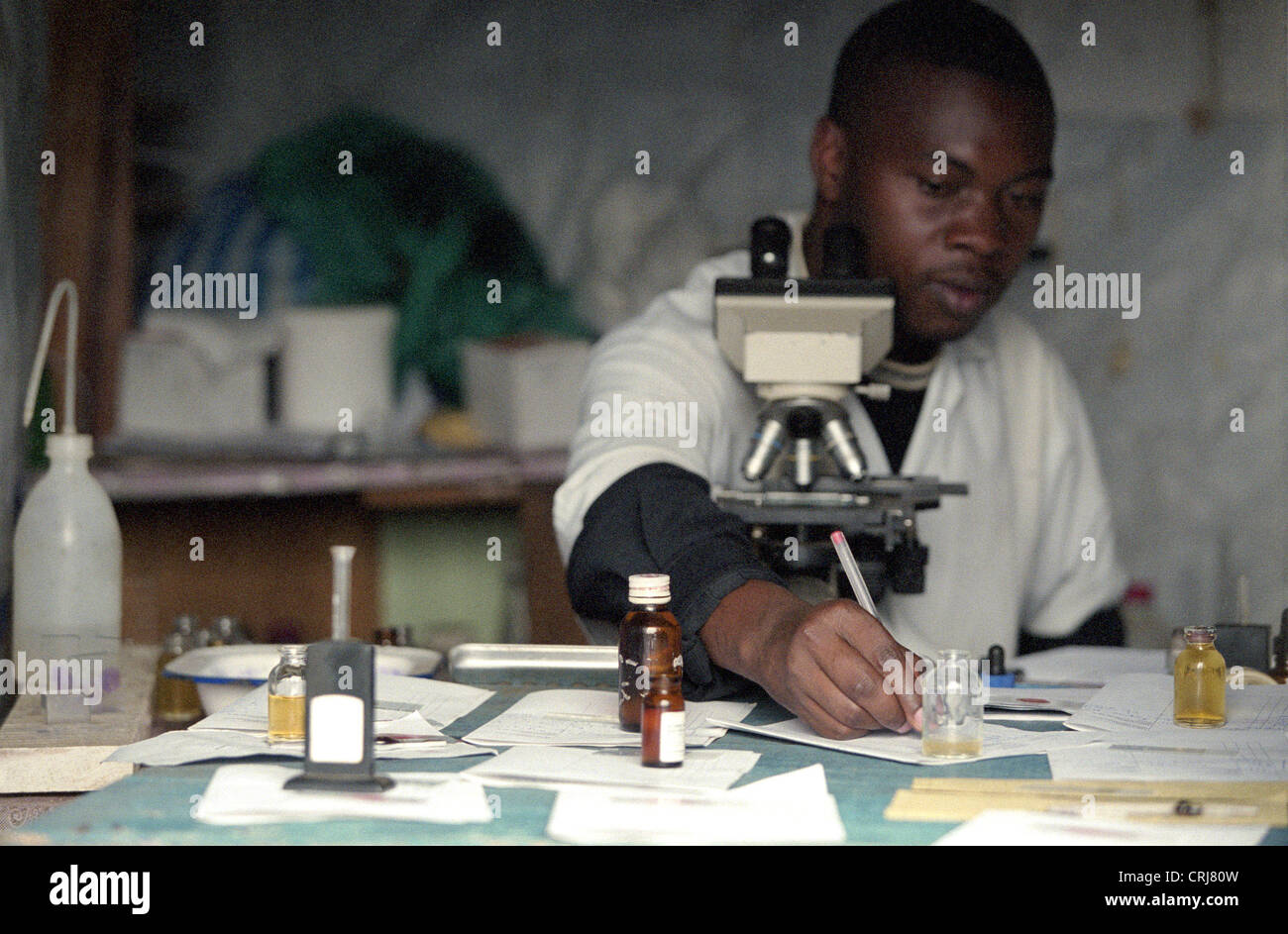 Screening at the microscope in Goma Stock Photo - Alamy