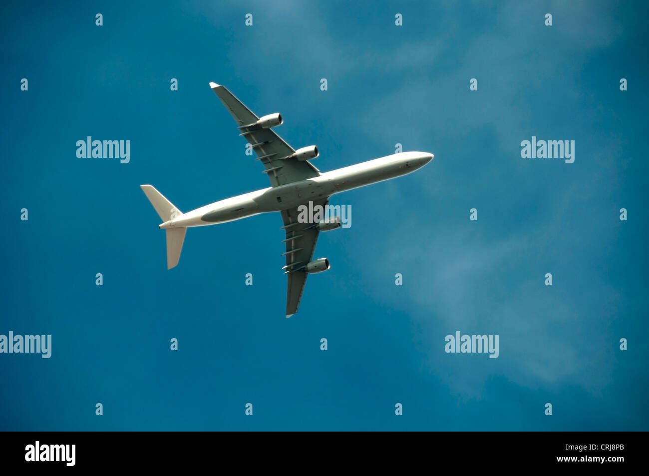fly away with the plane in blue sky Stock Photo - Alamy