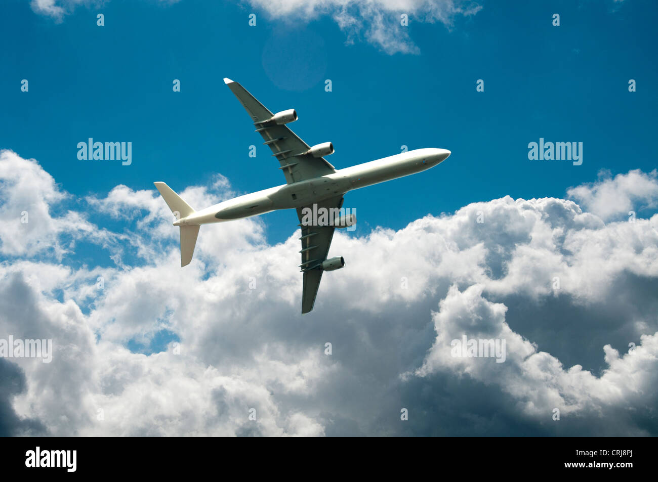 fly away with the plane in blue sky Stock Photo - Alamy