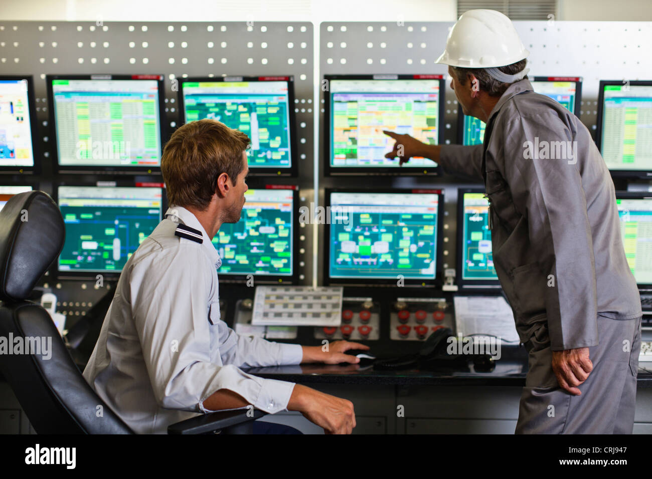 Security Guard In Control Room Stock Photos & Security Guard In Control ...