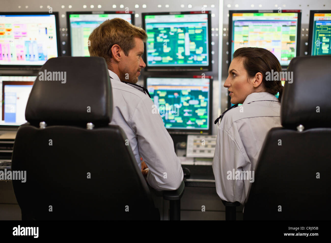 Security guard sitting on chair hi-res stock photography and images - Alamy