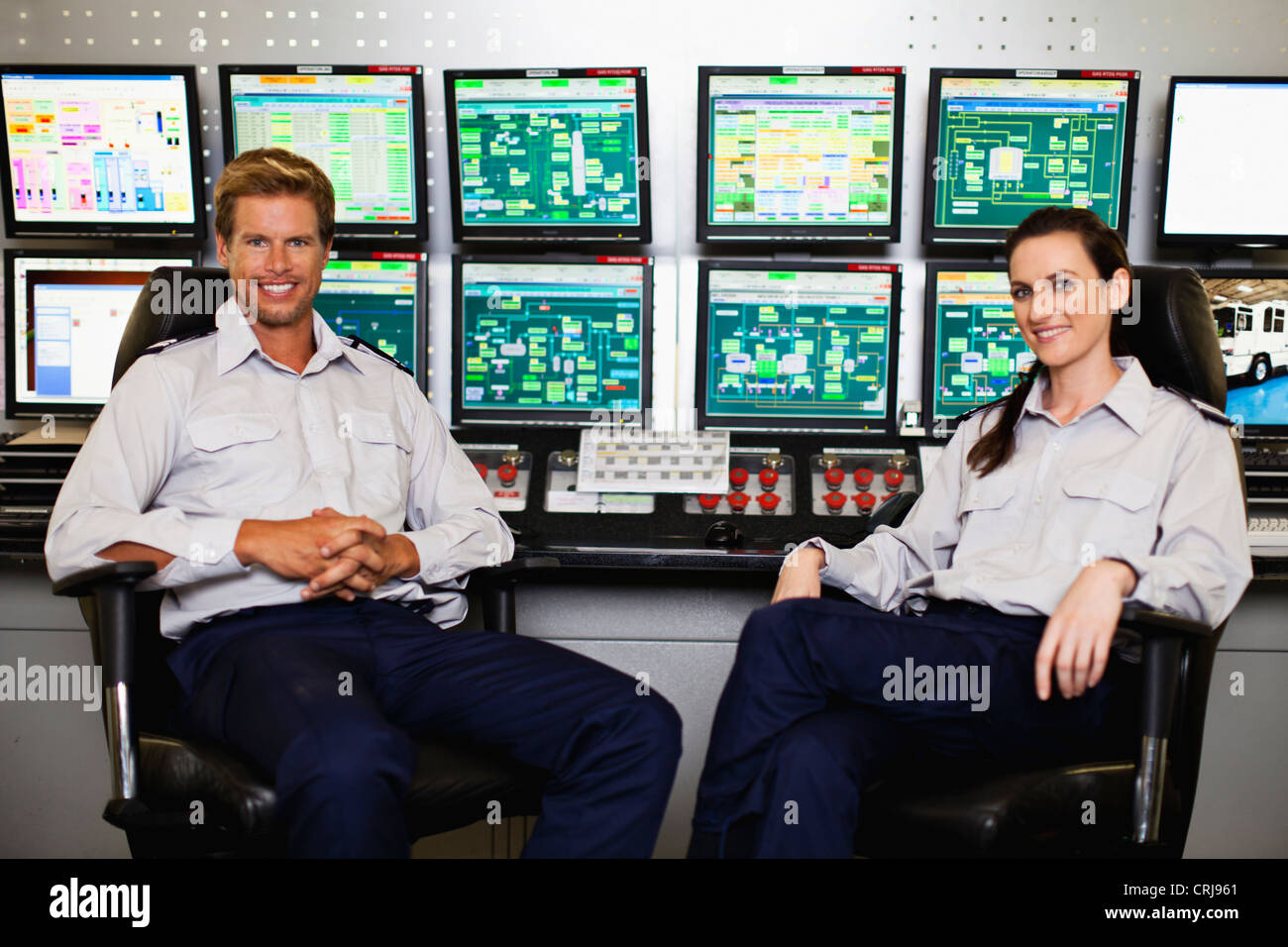 People working in security control room Stock Photo - Alamy