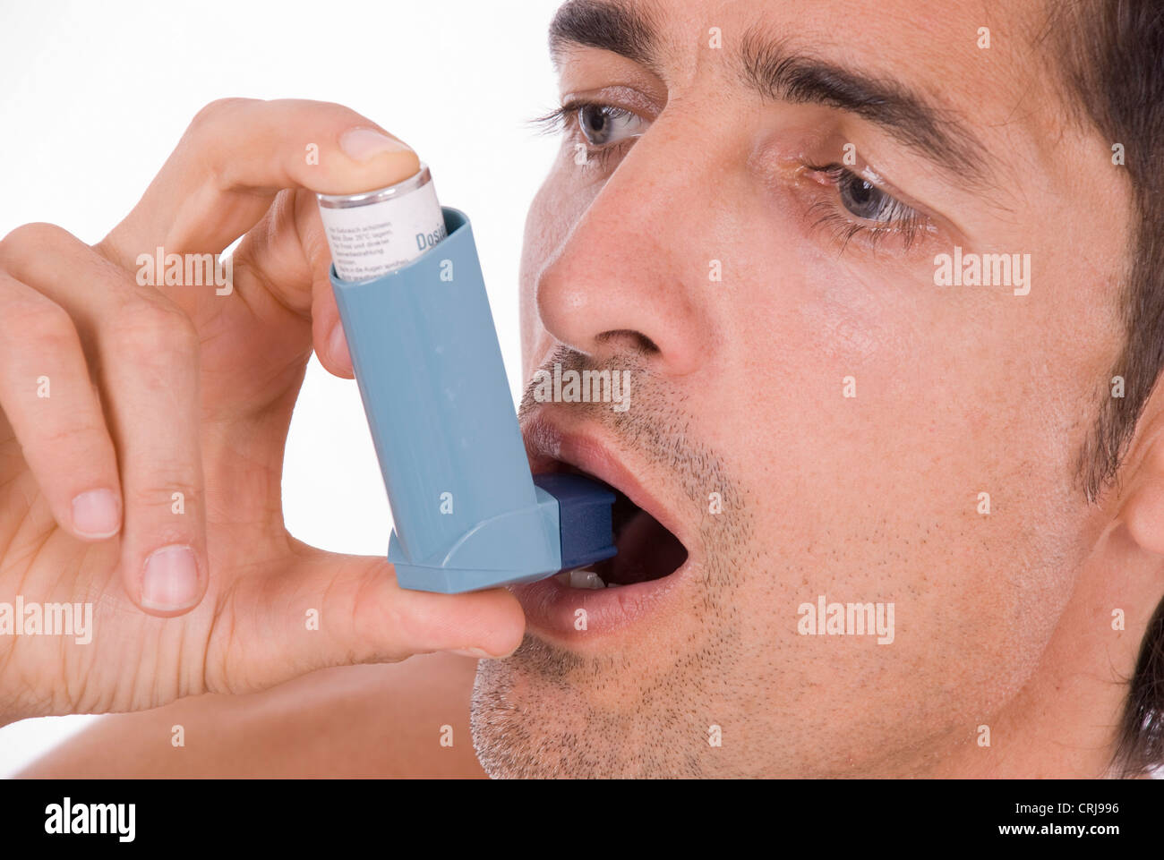 man using asthma spray Stock Photo - Alamy
