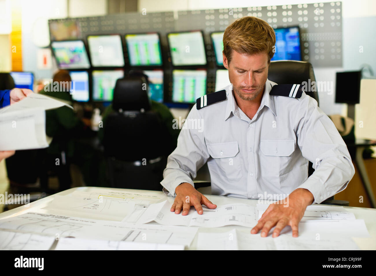 Man working in security control room Stock Photo - Alamy