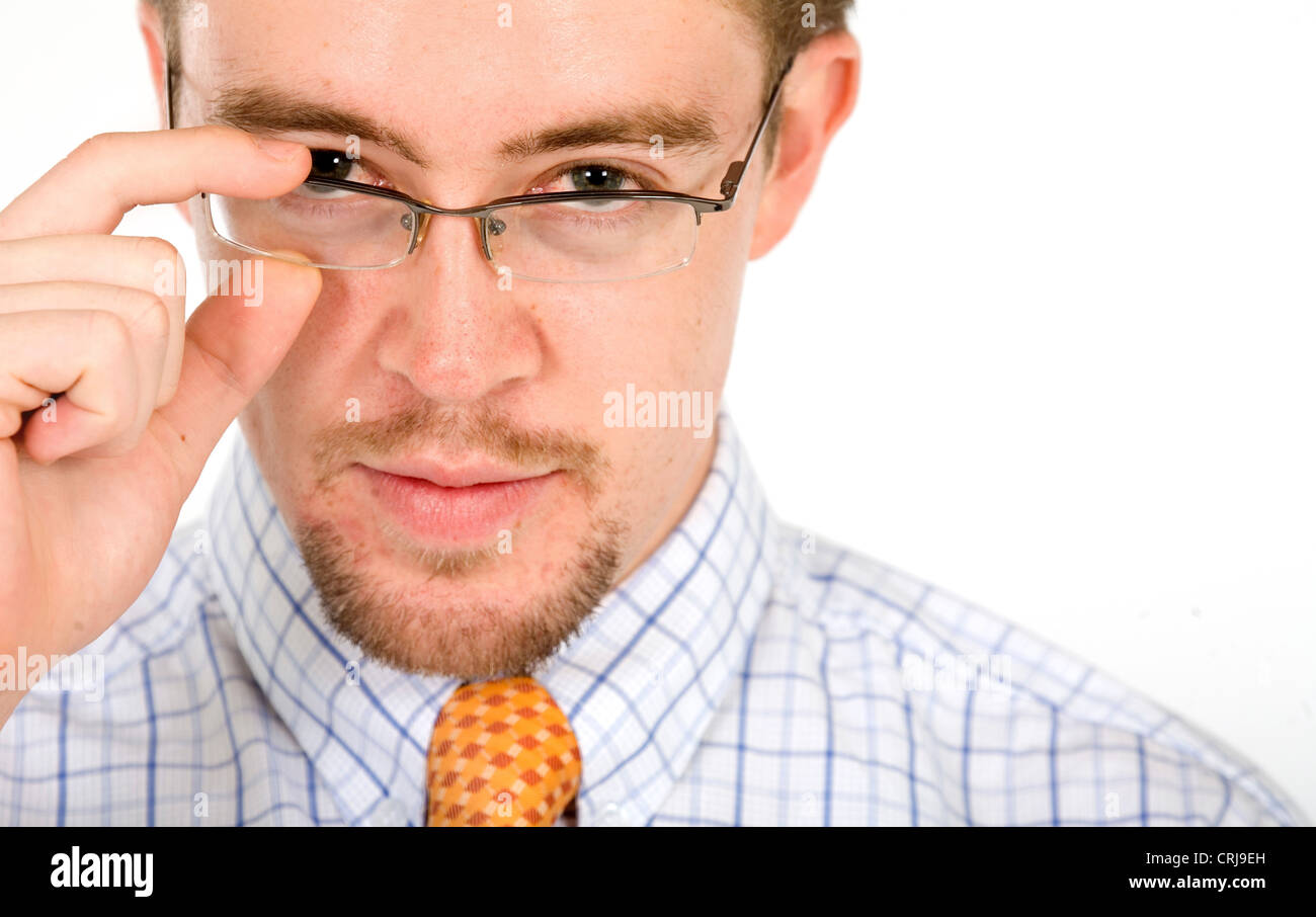 business man looking into camera over the rim of his glasses Stock ...