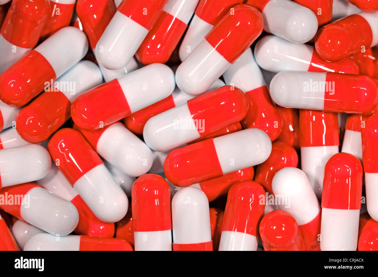 Red and white capsules hi-res stock photography and images - Alamy