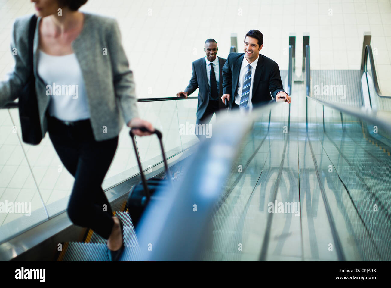 People ascending escalator hi-res stock photography and images - Alamy