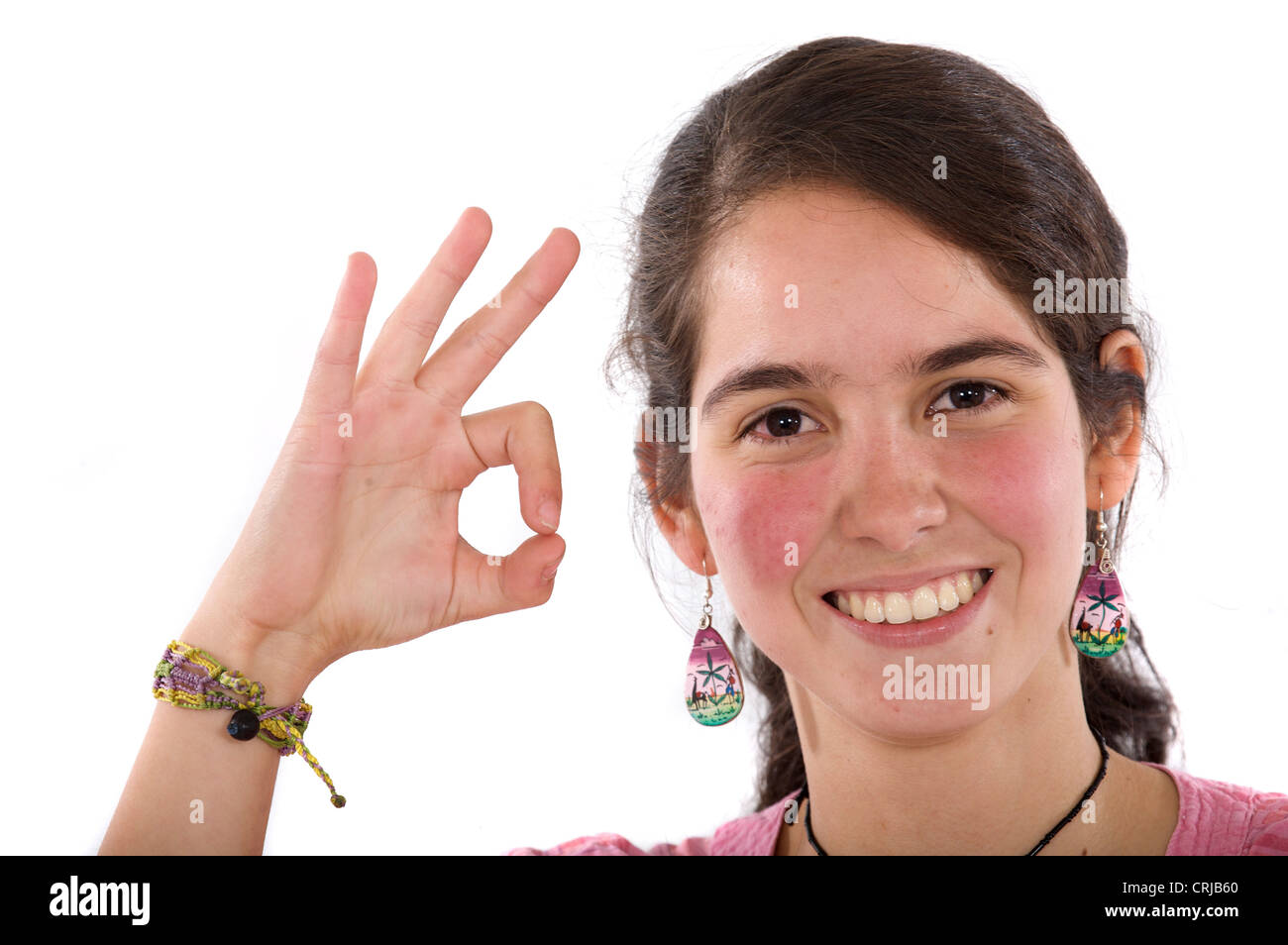 young woman doing an ok sign Stock Photo - Alamy
