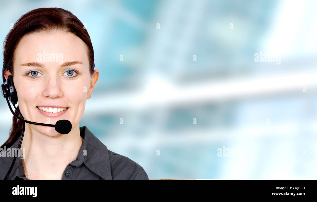 young customer service woman in an office Stock Photo - Alamy