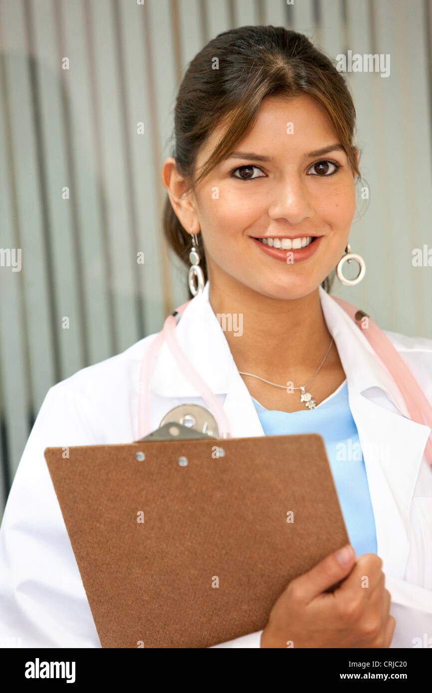 female doctor portrait in a hospital smiling Stock Photo - Alamy