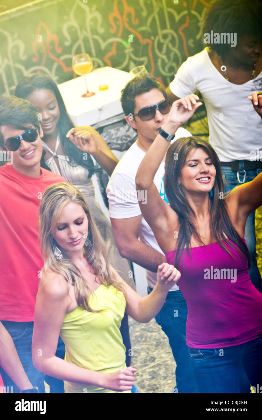 group of happy friends smiling in a bar or a nightclub Stock Photo - Alamy