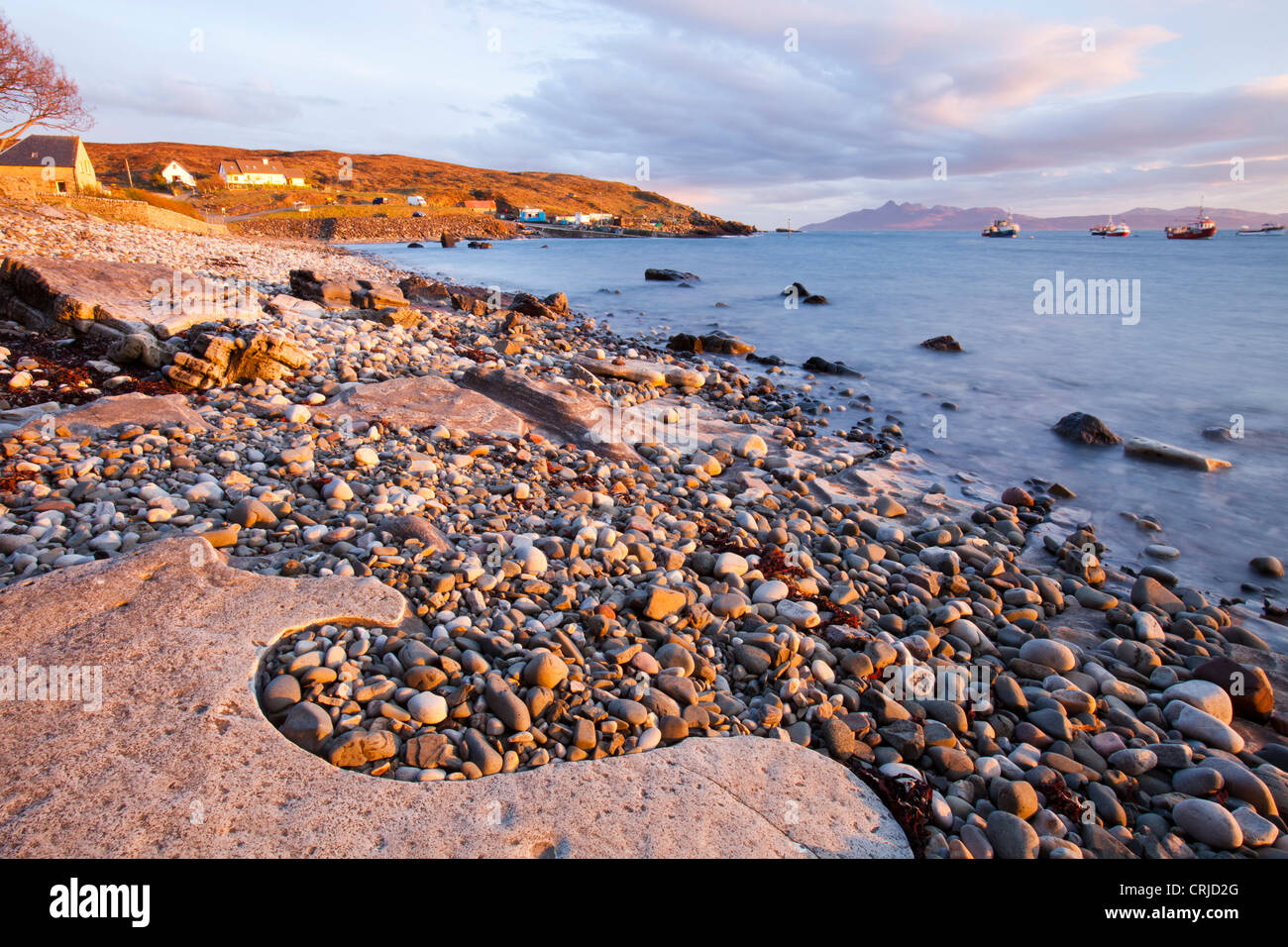 The Isle of Rhum from Elgol, Isle of Skye, Scotland, UK, at sunset ...