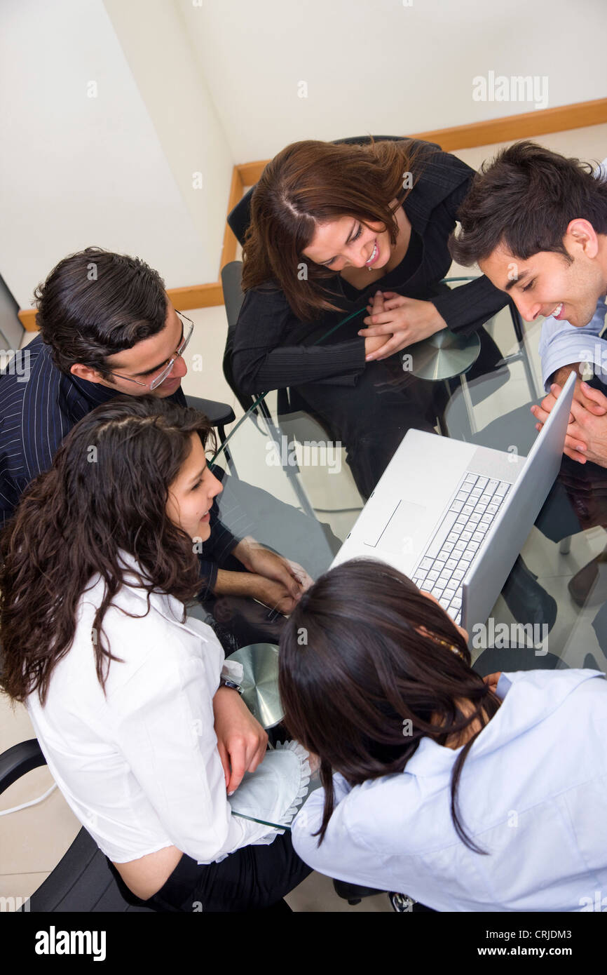 business team in a meeting on a laptop computer in an office Stock ...